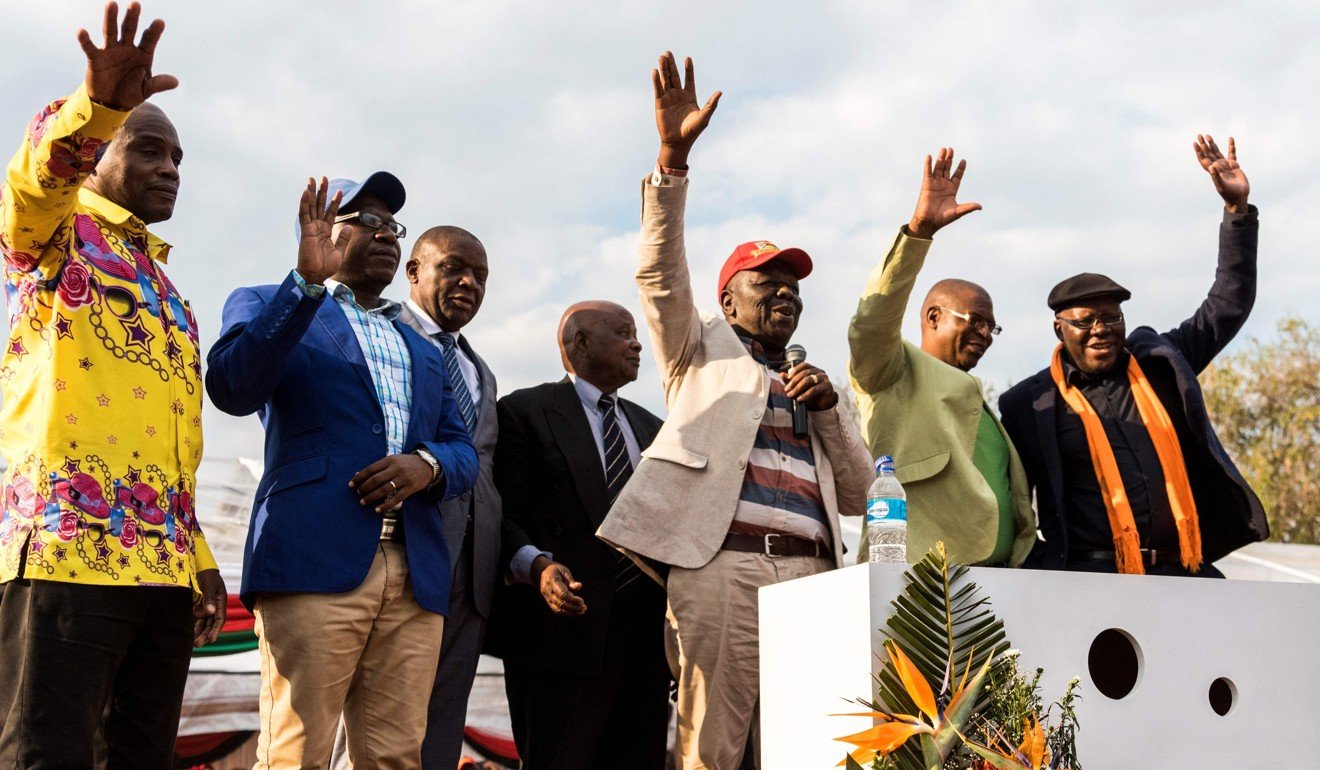 Zimbabwe’s opposition parties unite to take on Mugabe | South China ...