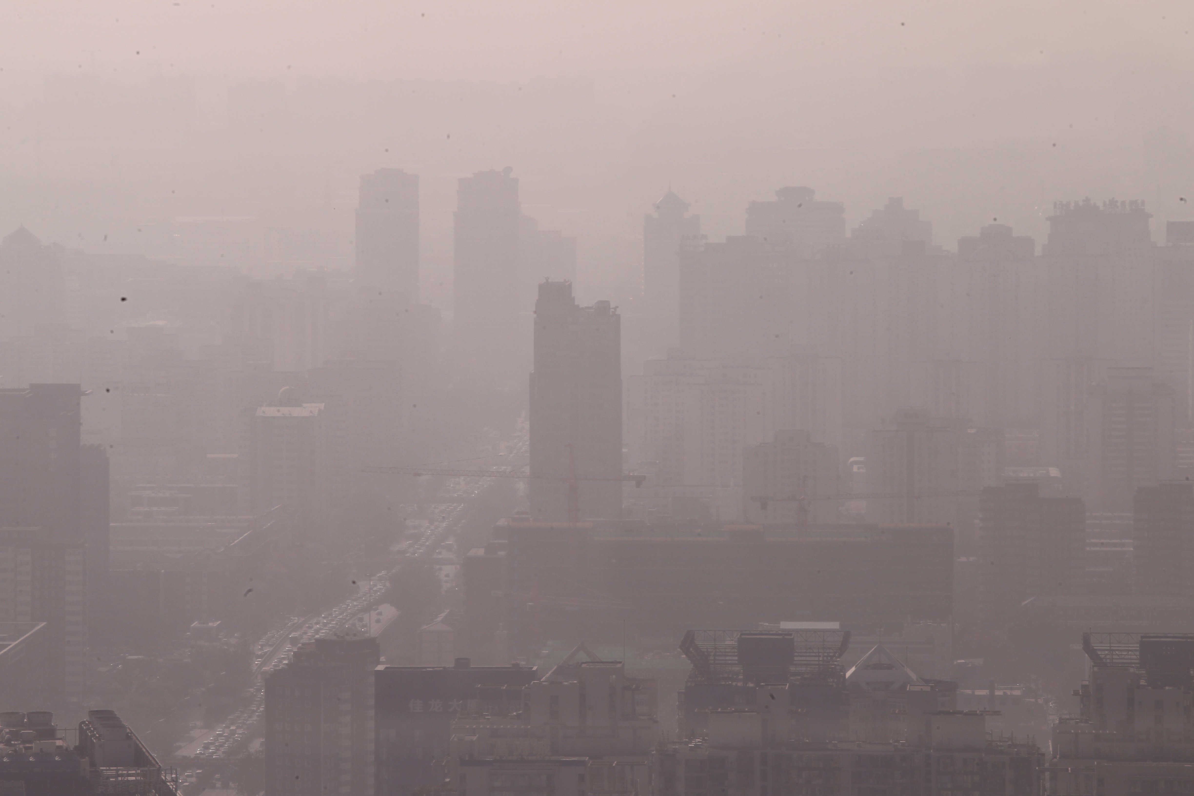 Beijing to halt construction as smog closes in just weeks after ...