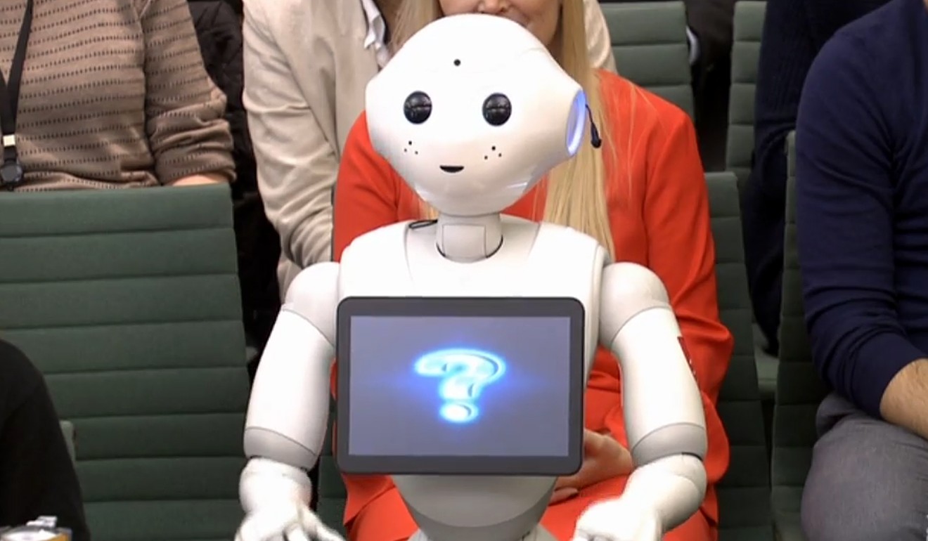 Robot’s debut in UK parliament provokes ‘Maybot’ mockery for PM Theresa ...