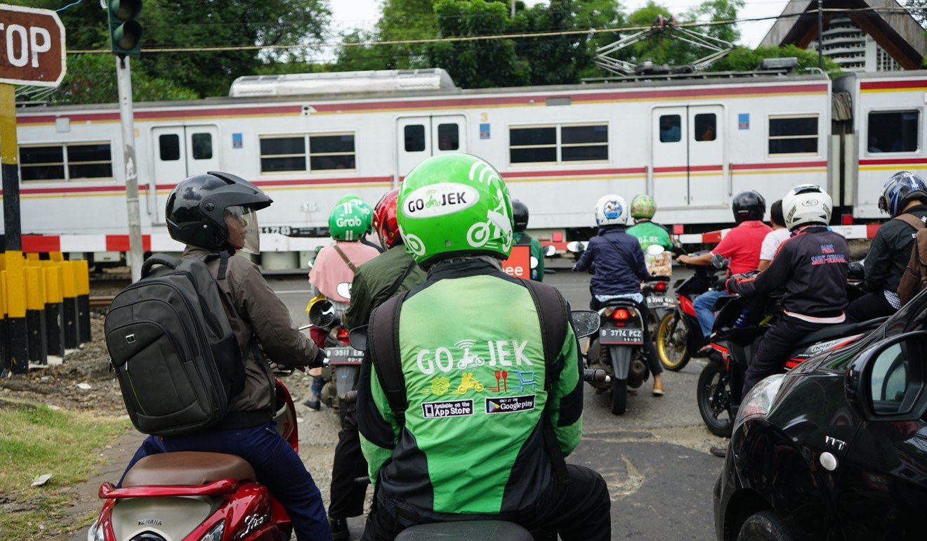 Indonesia plans to standardise rates for Grab and Go-jek, curtailing ...