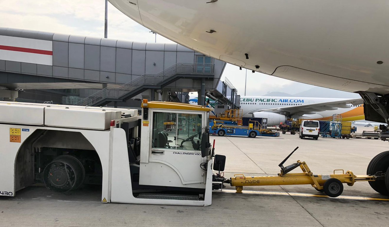 Dramatic footage emerges of tyre explosion on aircraft tug at Hong Kong ...