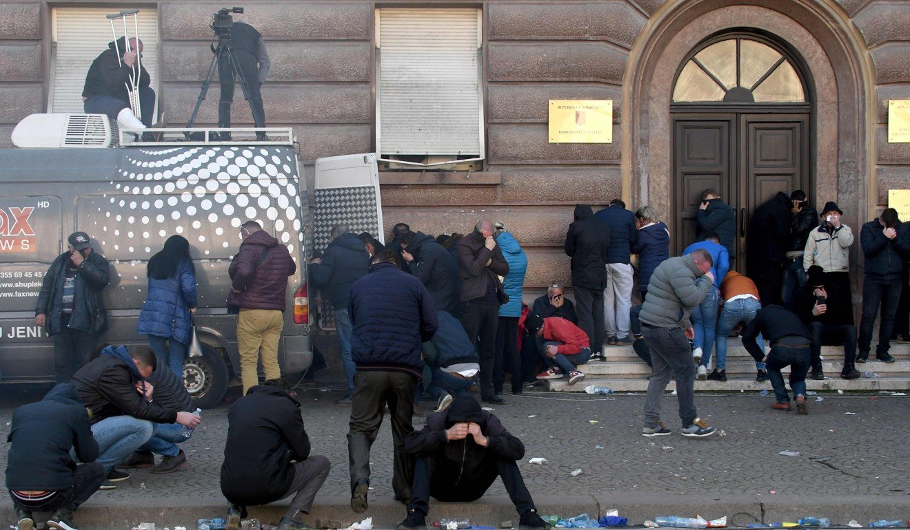 Police and protesters clash outside Albanian parliament | South China ...