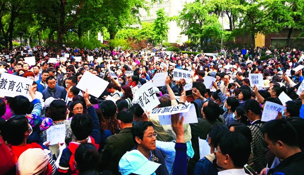 Thousands of Chinese parents take to the streets to protest university ...