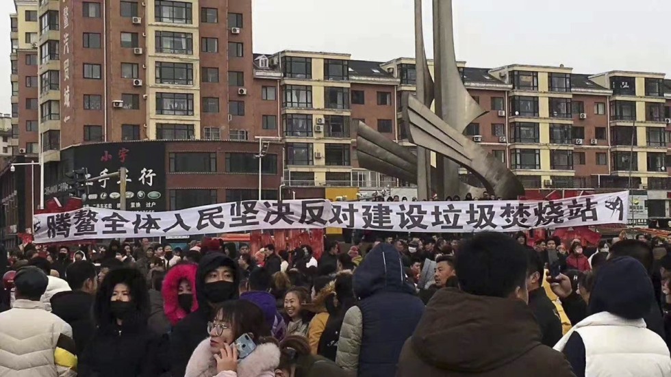 Chinese town residents clash with riot police in protests over ...