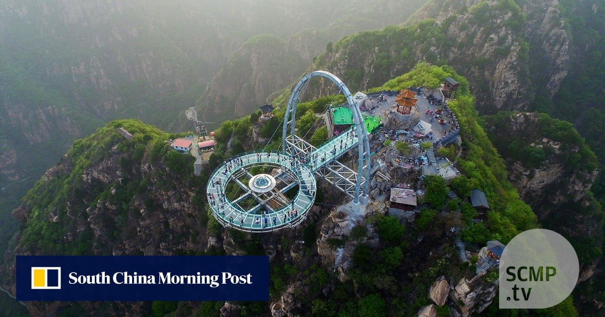 China's towering glass-bottom platform opens in Beijing | South China ...